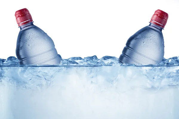 Cold Water Bottles In Ice Cubes Stock Photo by ©somchaij 64744311