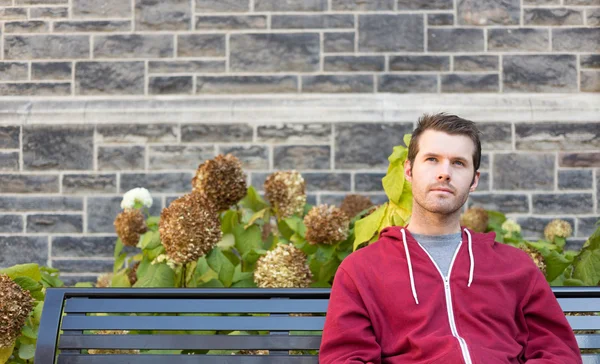 Man thinking on a log — Stock Photo © macinlondon #34763157