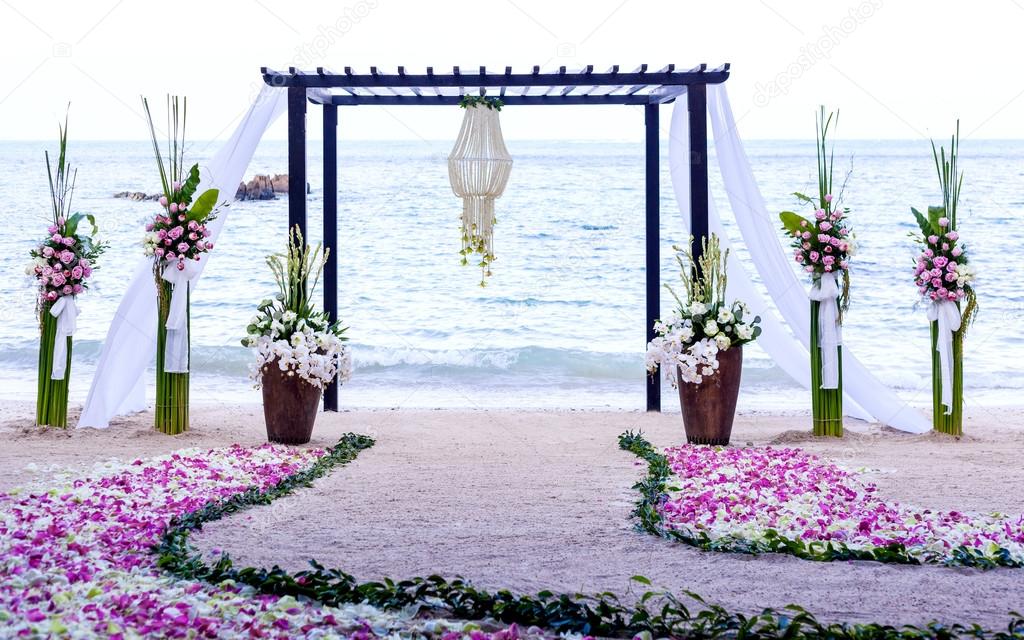 Wedding setting venue on the beach . — Stock Photo © Kerdkanno #70456651