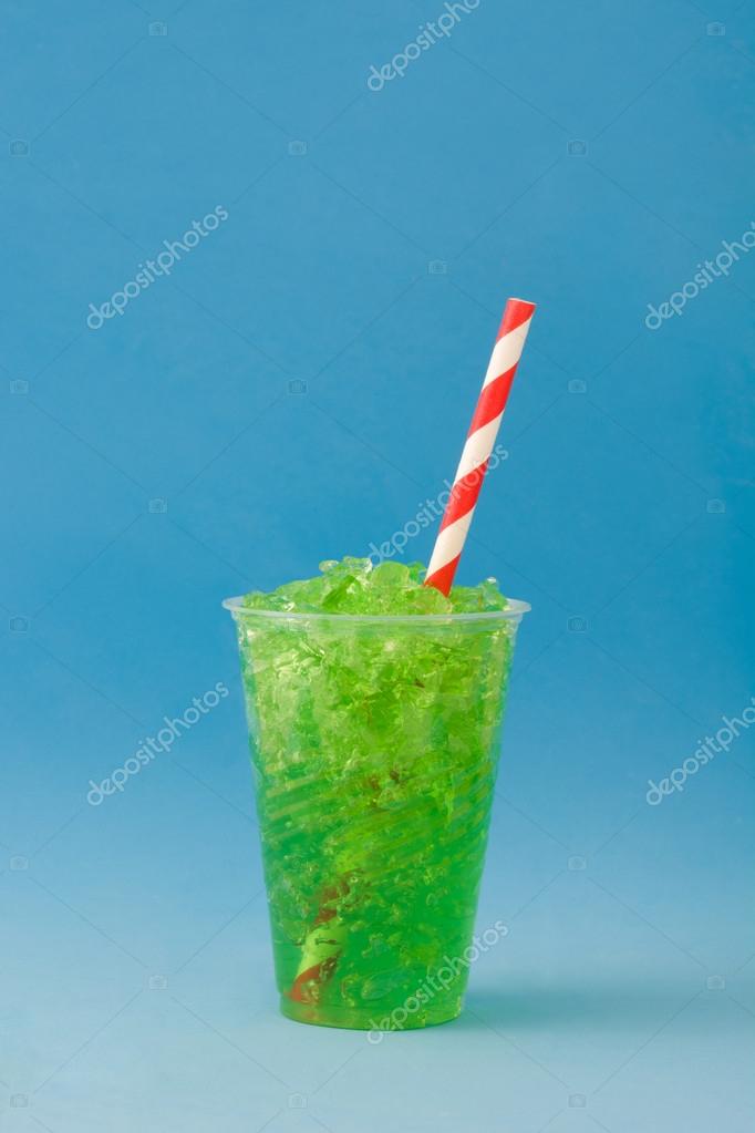 Green slushie. Blue background Stock Photo by ©etorres69 108754550