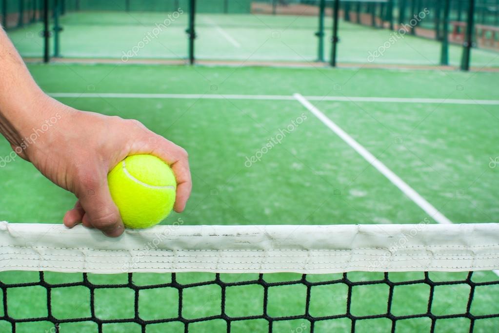 Man with tennis ball in hand Stock Photo by ©etorres69 68358871