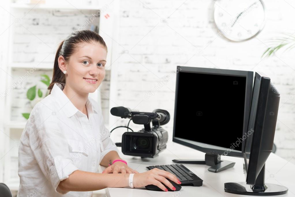 Pretty young woman video editor Stock Photo by ©philipimage 80514346
