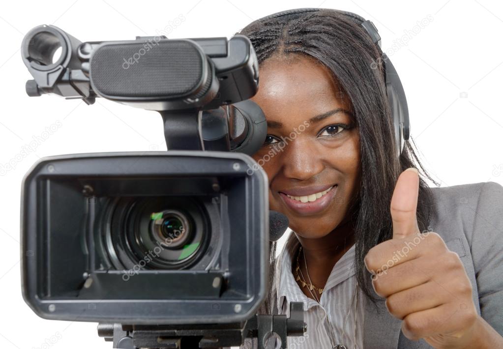 Young African American women with professional video camera and — Stock Photo © philipimage ...