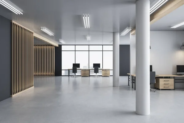 Luxury coworking office hall with decorative columns and computers on ...