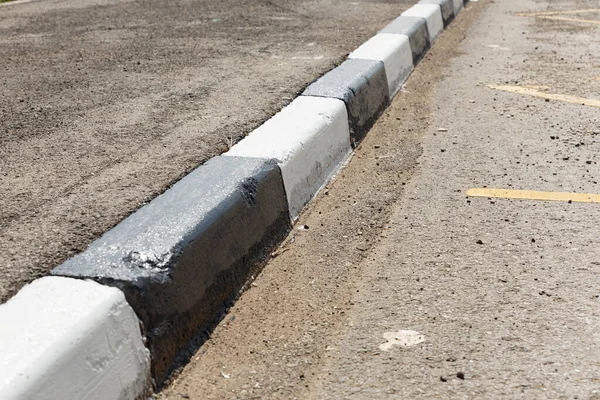 Parking lot curb Stock Photos, Royalty Free Parking lot curb Images ...