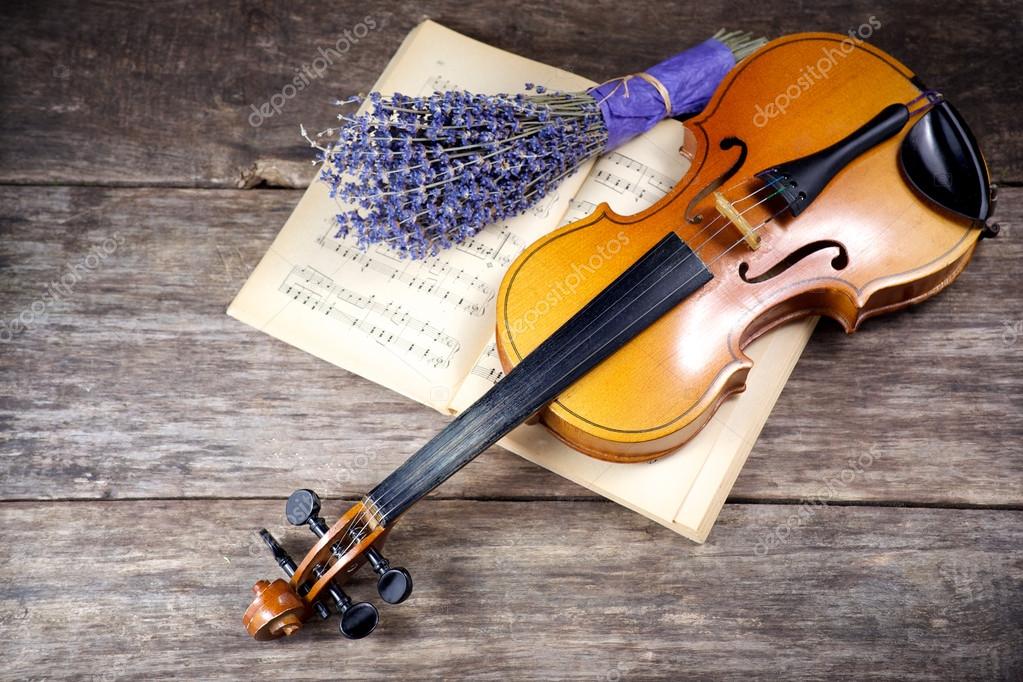 Vintage viola on sheet music Stock Photo by ©vetre 70724621