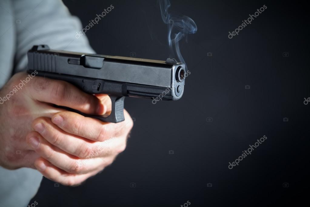 Male hand with a gun Stock Photo by ©vetre 90716530