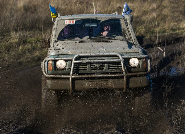 Unknown rider on the off-road vehicle overcomes a route - Stock Image ...