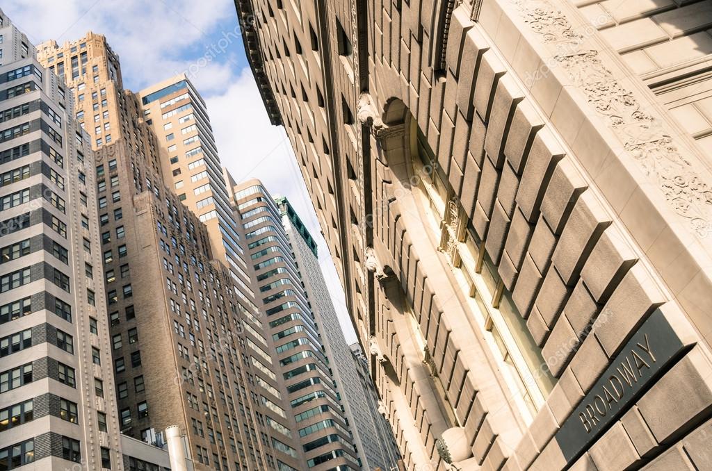 Tilted composition of high buildings and skyscrapers in Broadway ...