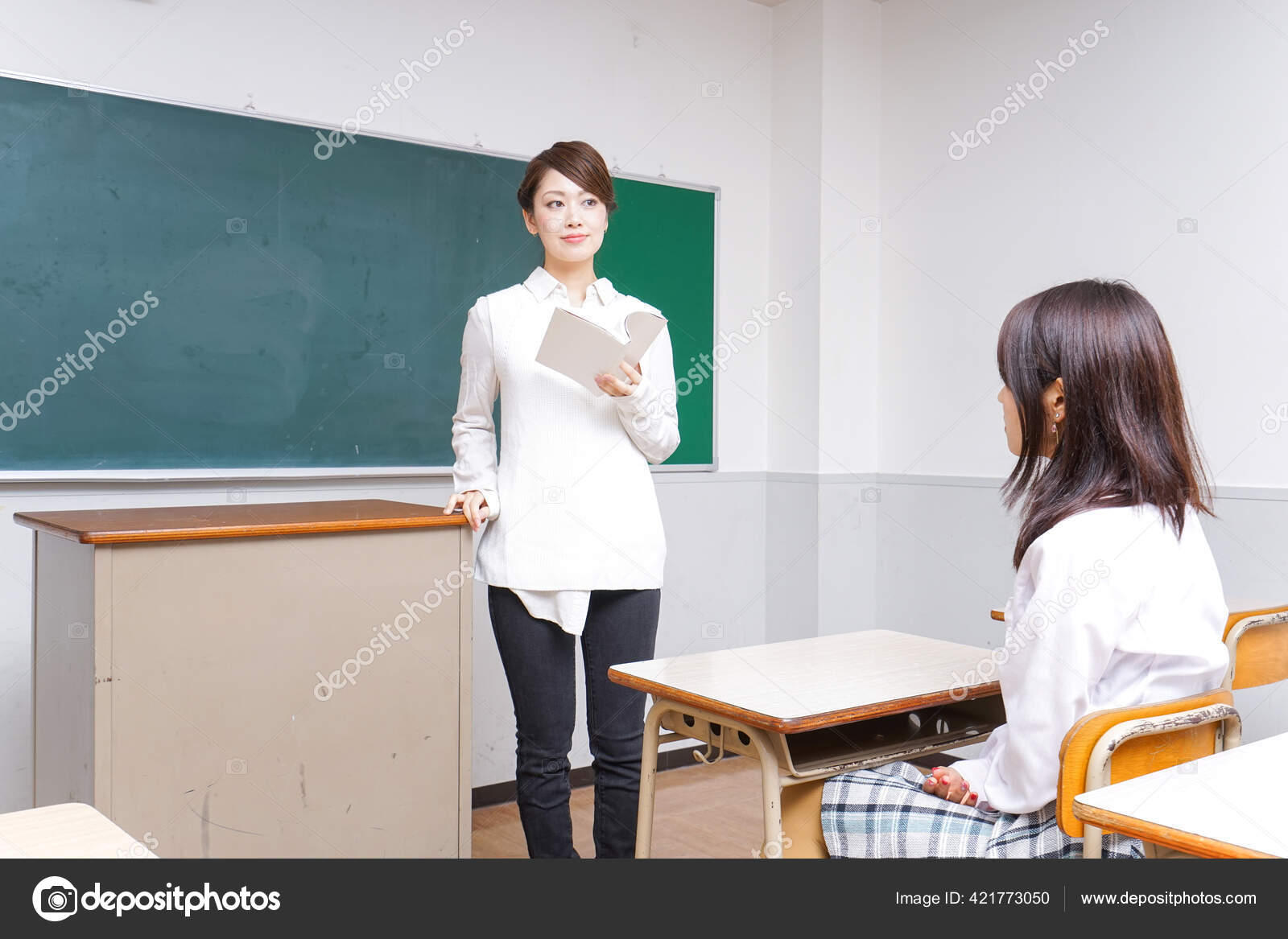 Female Teacher Having Books Giving Lessons — Stock Photo © maroke ...
