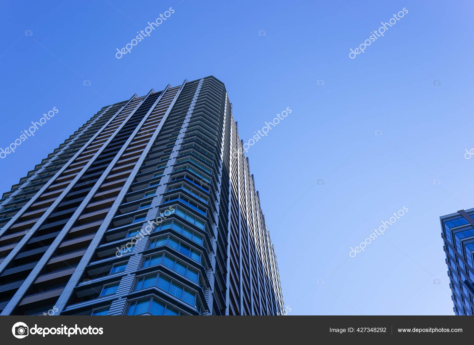 Tower Building Blue Sky Background Stock Photo by ©maroke 427348292