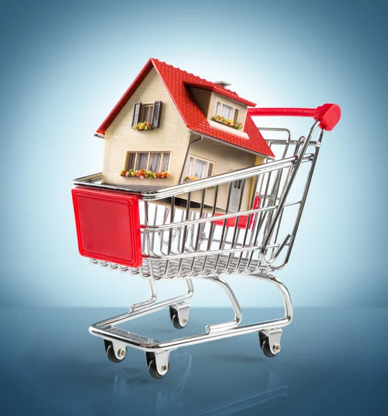 House in shopping-cart - for real estate background — Stock Photo ...