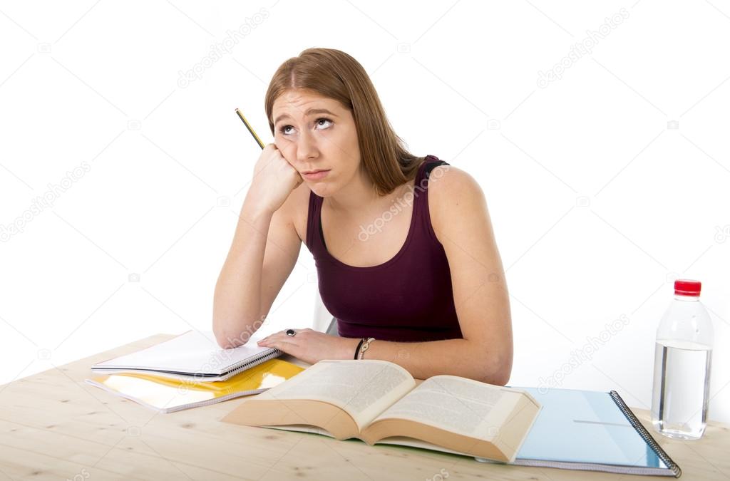 College student girl studying for university exam worried in stress ...