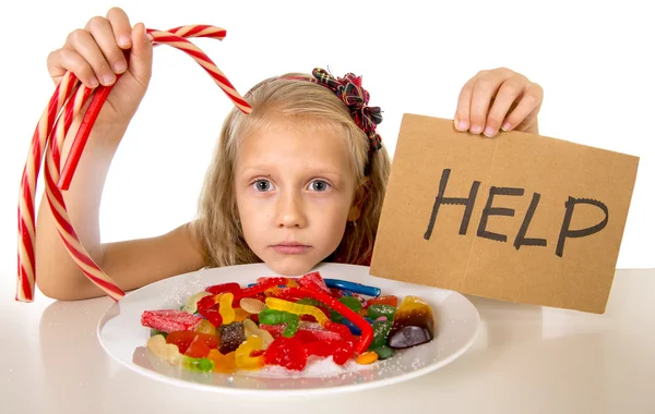 Little female child nutrition abuse of sweet and sugar in candy ...