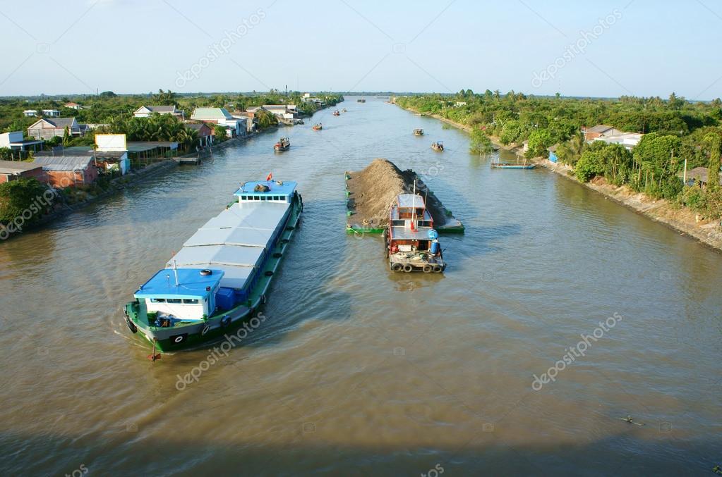 Asia river traffic, Mekong Delta, transport cargo Stock Photo by ...