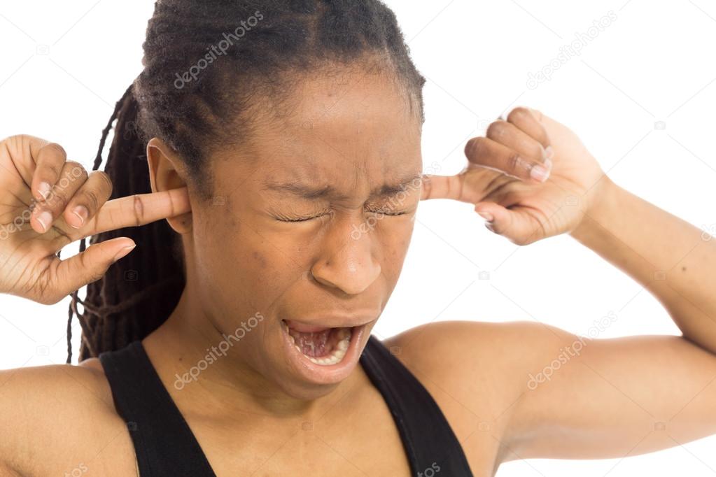 Model plugging her ears by fingers Stock Photo by ©Bruno135 73084143