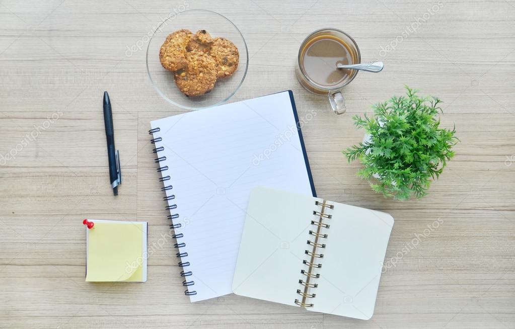 Blank paper and office tools on the wood table - Top view Stock Photo ...