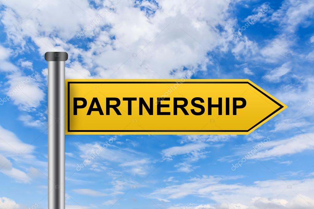 Yellow road sign with partnership words — Stock Photo © pichetw #75338195