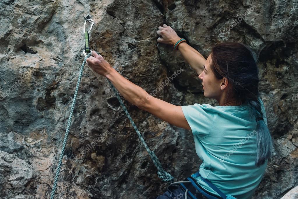 Climber with rope and quickdraw Stock Photo by ©Remains 117406032