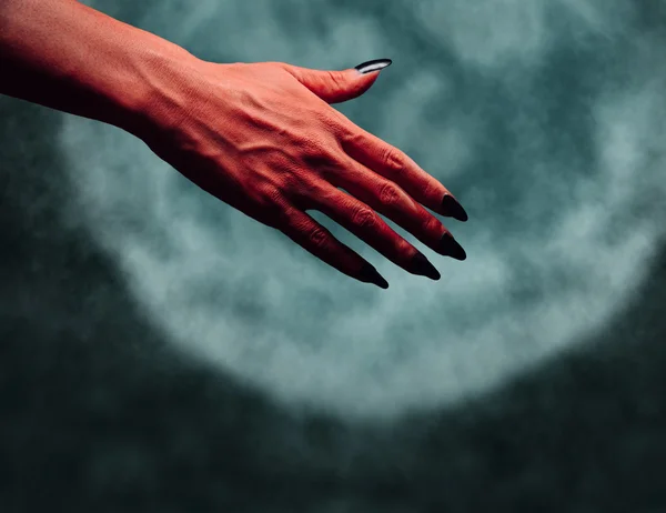 Hands of the devil at midnight Stock Photo by ©Remains 54177387