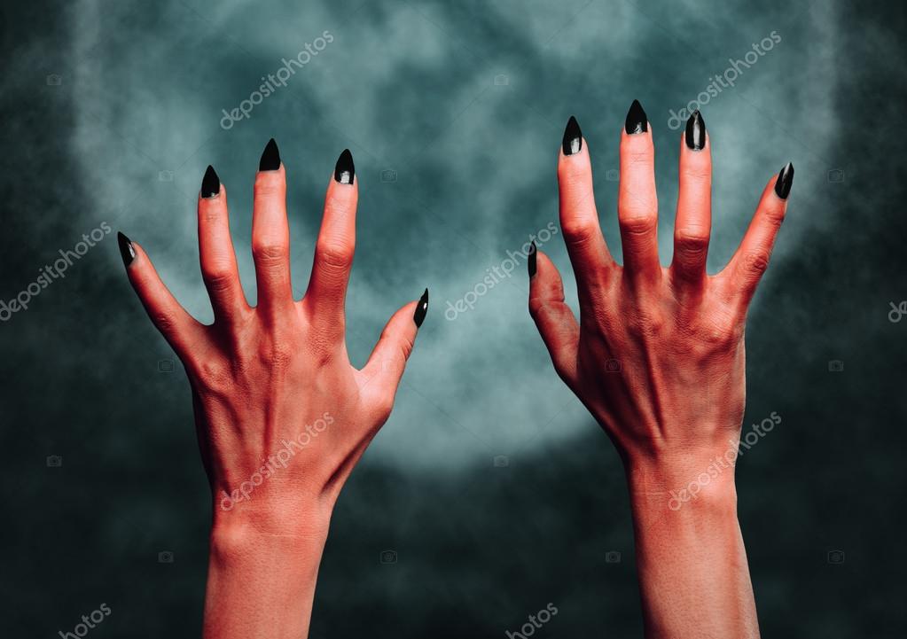Hands of the devil at midnight Stock Photo by ©Remains 54177387