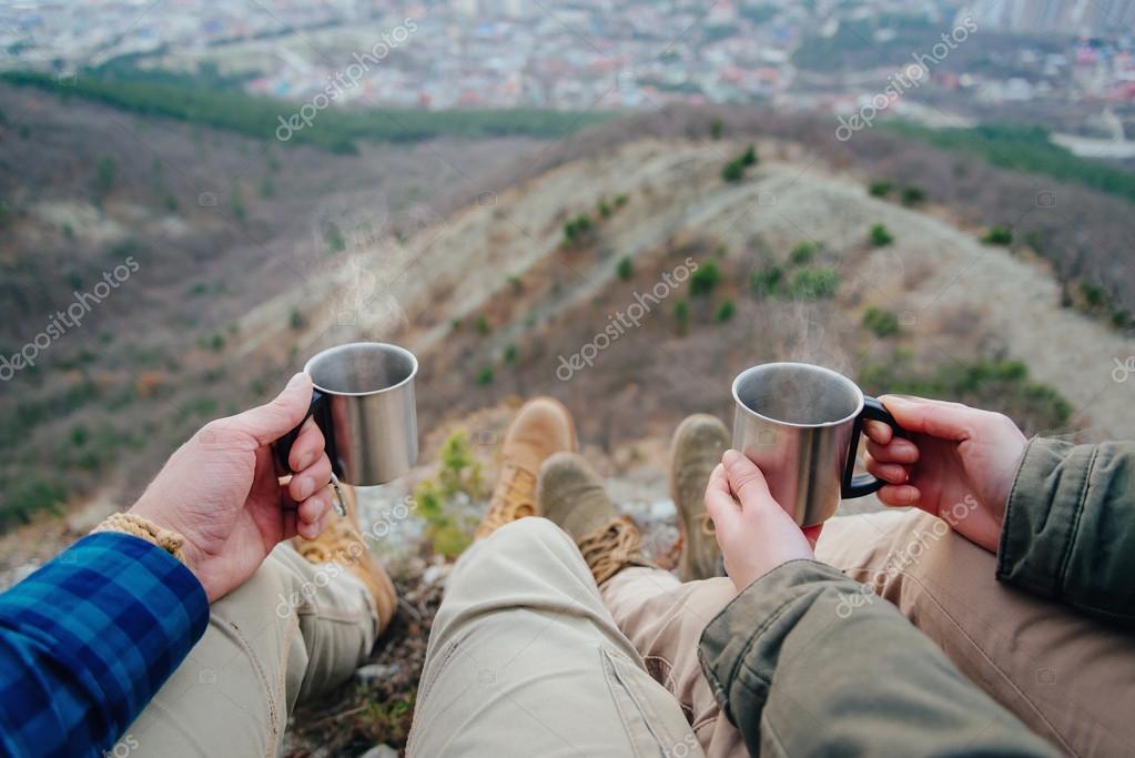 Couple drinking tea in mountains — Stock Photo © Remains #96933666