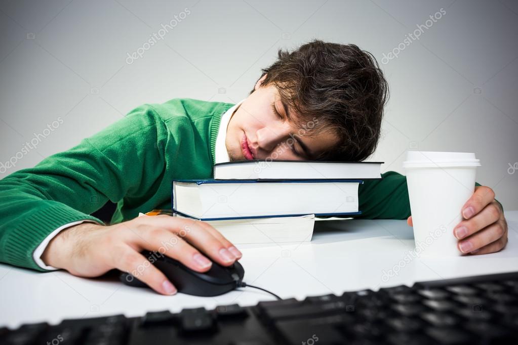 Person Sleeping At Desk