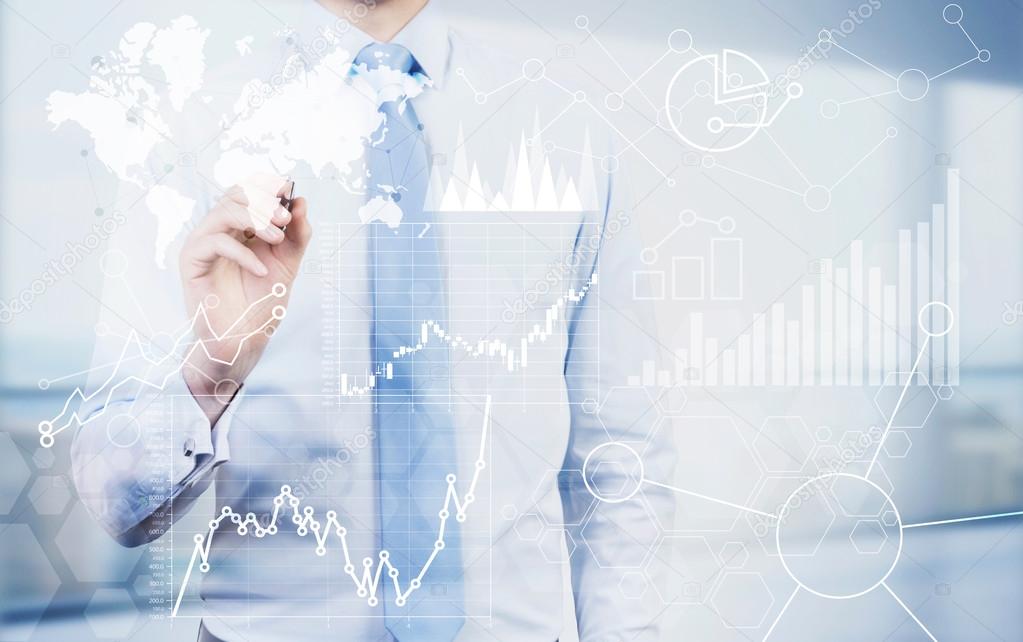 Man drawing financial charts Stock Photo by ©denisismagilov 116178188