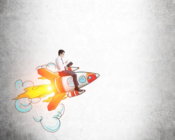 Businessman riding rocket - Stock Image - Everypixel