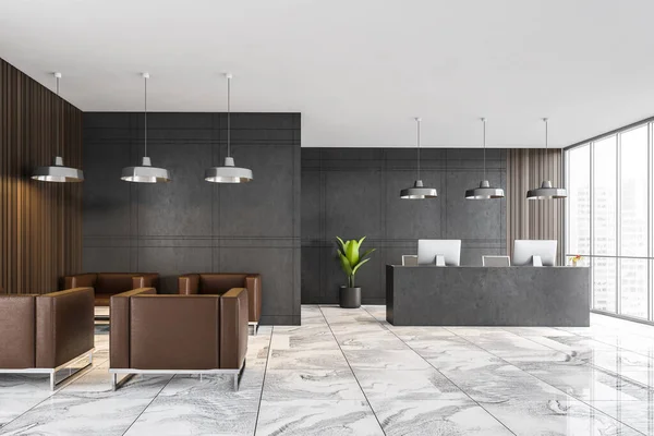 Grey reception hall, front view, with four leather armchairs for ...