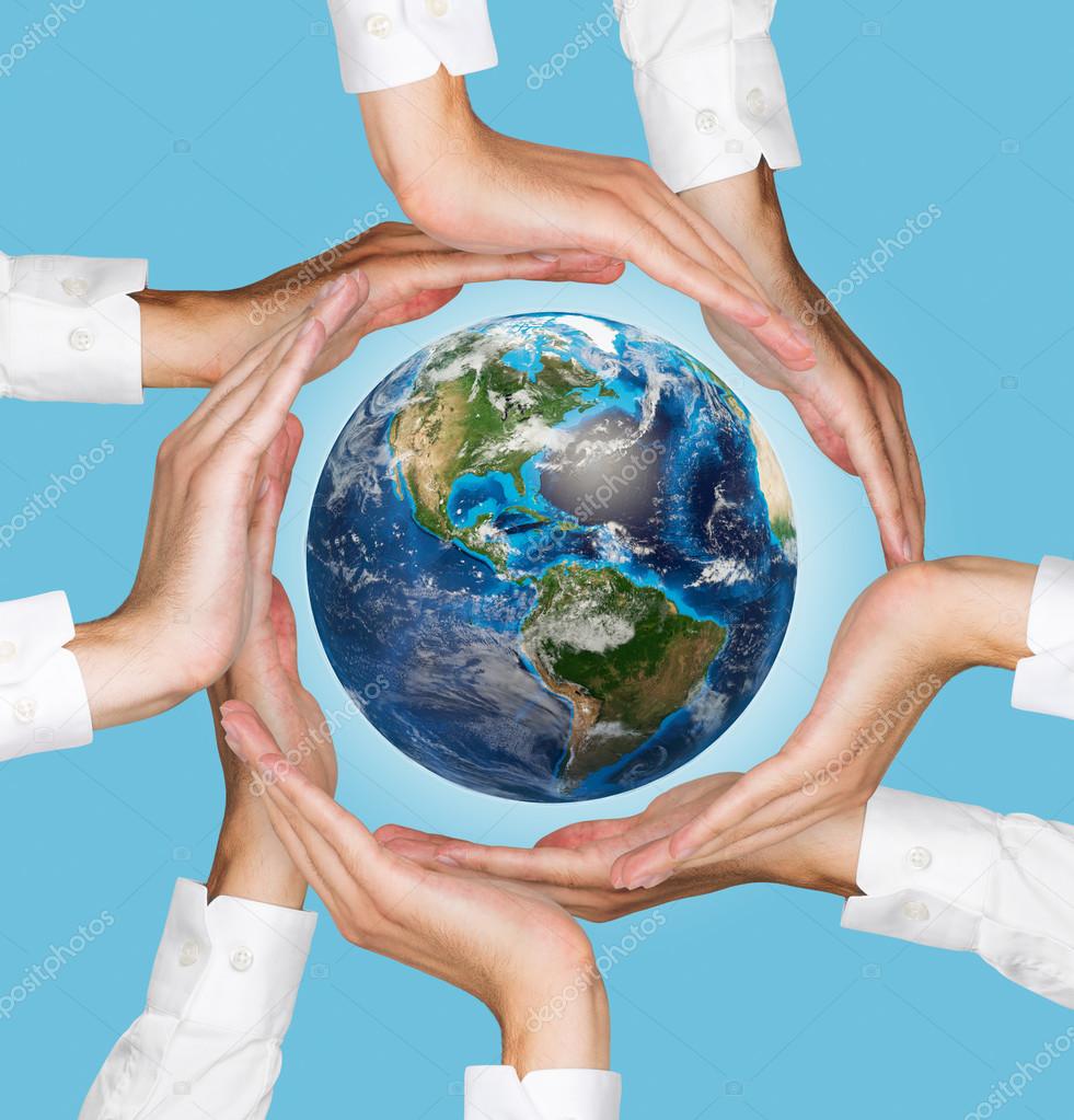 Hands holding Planet Stock Photo by ©denisismagilov 60488213