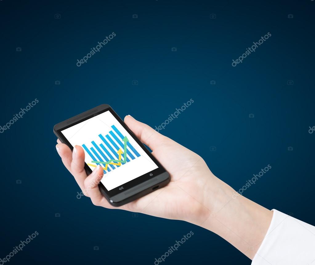 Cellphone with charts Stock Photo by ©denisismagilov 61924567