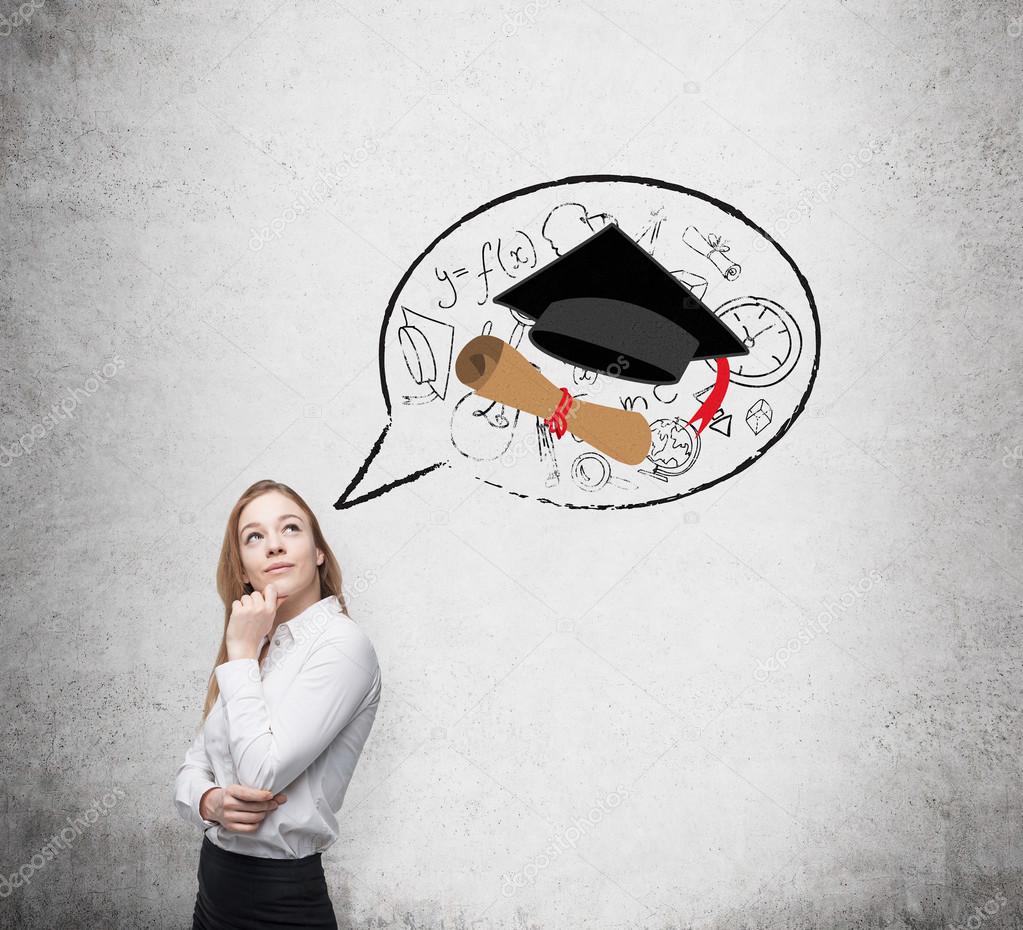Beautiful student is thinking about graduation and future career ...