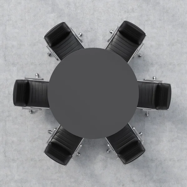 Top view of a conference room. A white round table and six chairs ...