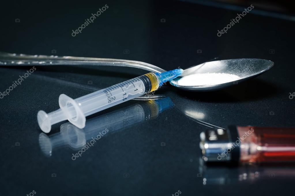 Heroin Syringe And Spoon