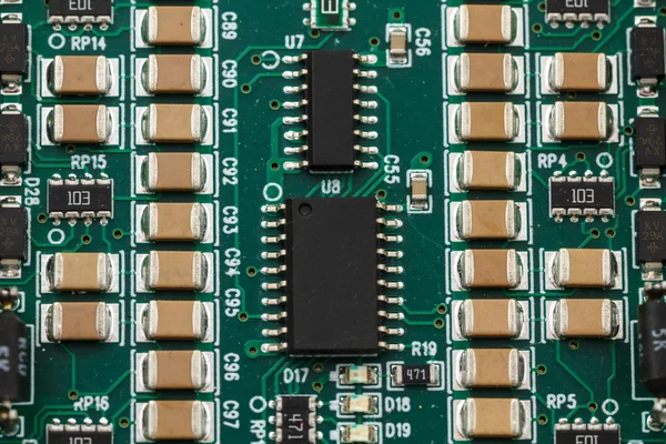 Printed circuit board with ICs, chip capacitors, tantalum capacitors ...