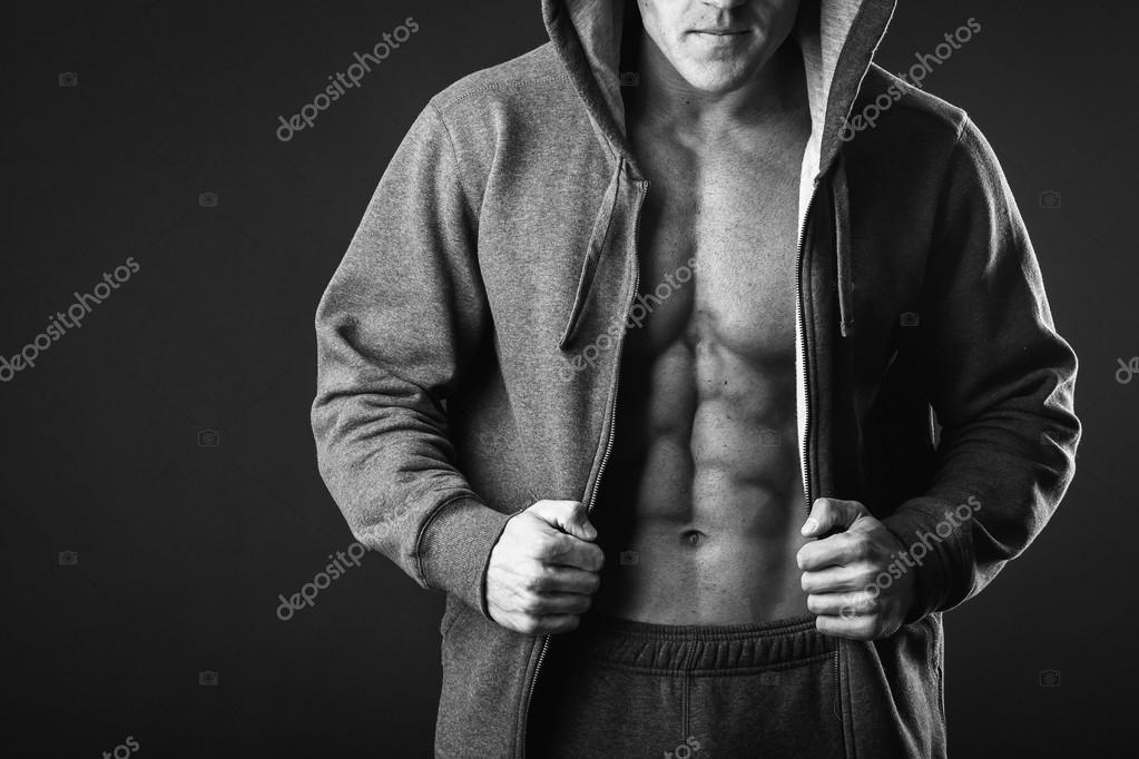 Man with open jacket revealing muscular chest Stock Photo by ©aallm ...