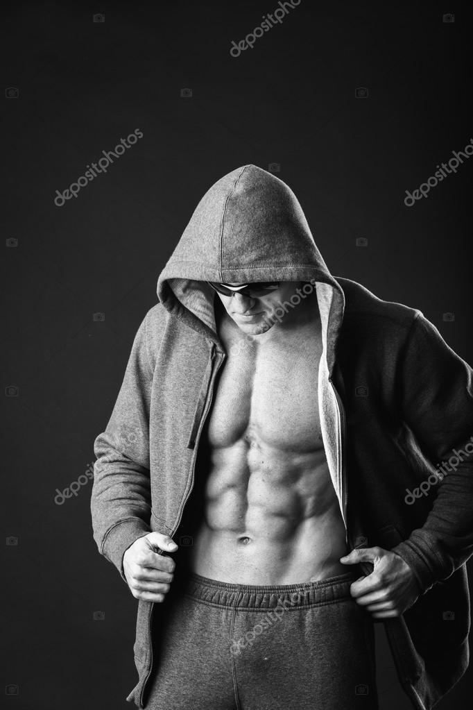Muscular man with open jacket Stock Photo by ©aallm 65723155