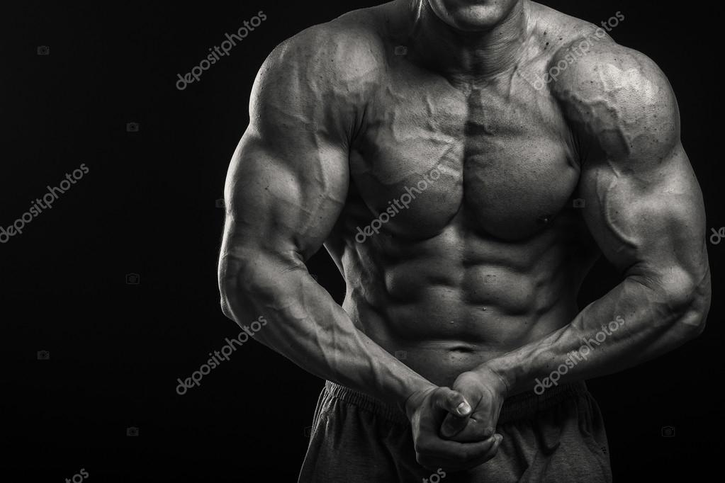 Bodybuilder shows his muscles — Stock Photo © aallm #70404035