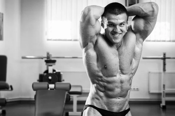 man shows muscles - Stock Image - Everypixel