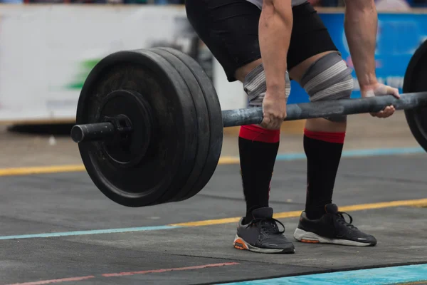 Professional athletes performing strength exercises - Stock Image ...
