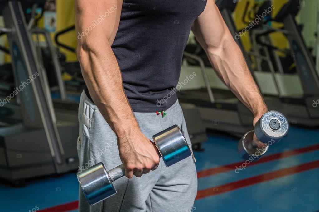 Strength training professional athlete in the gym — Stock Photo © aallm ...