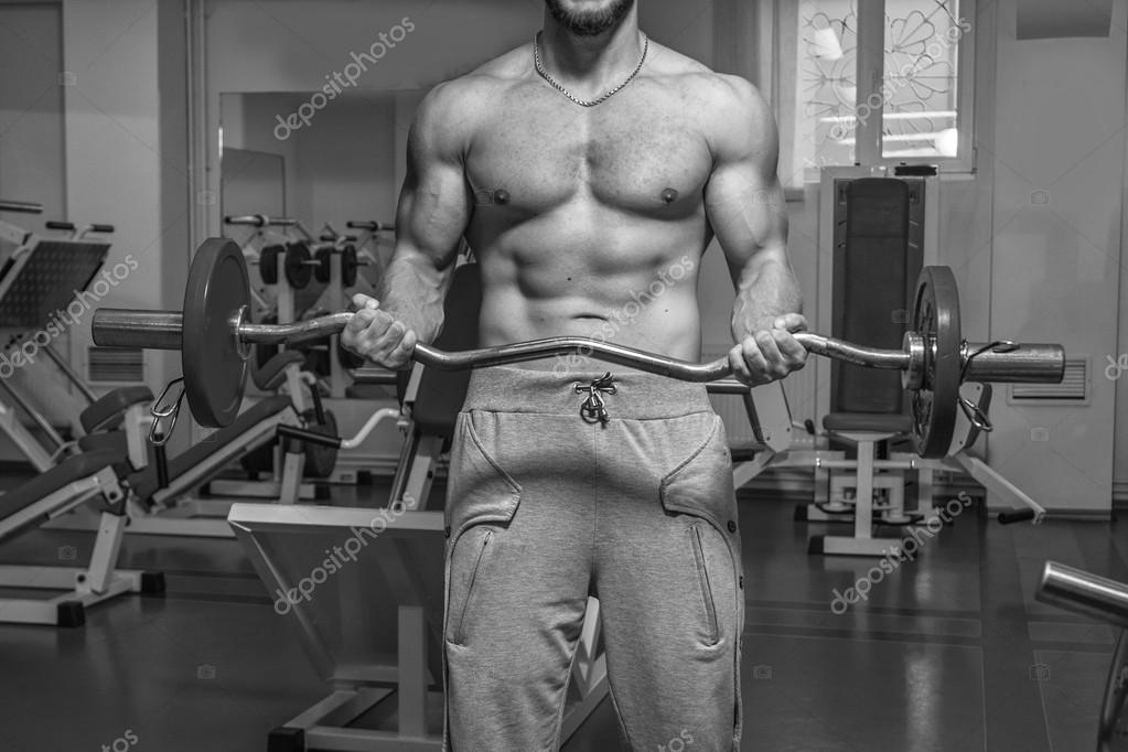 Strength training professional athlete in the gym — Stock Photo © aallm ...