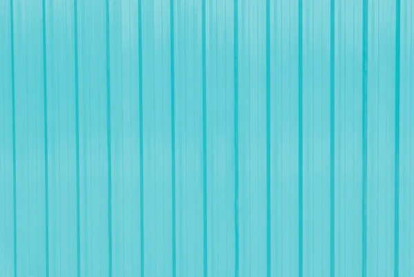 Corrugated iron is new. Texture color. Background cyan, aquamarine ...