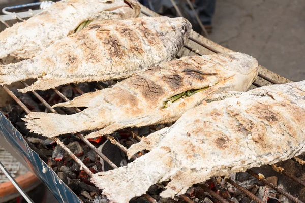 Grilled white snapper fish coated rock salt - Stock Image - Everypixel