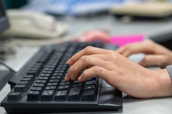 Woman using keyboard Stock Photo by ©LDProd 58260821