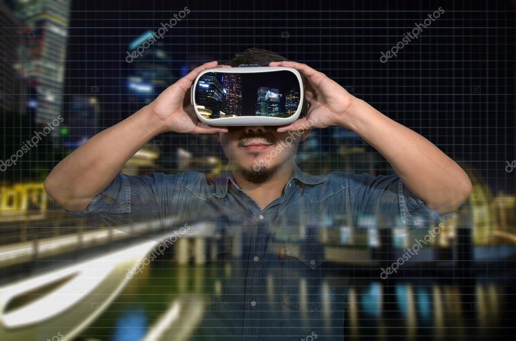 Asian Man wearing virtual reality — Stock Photo © Tzido #123425956