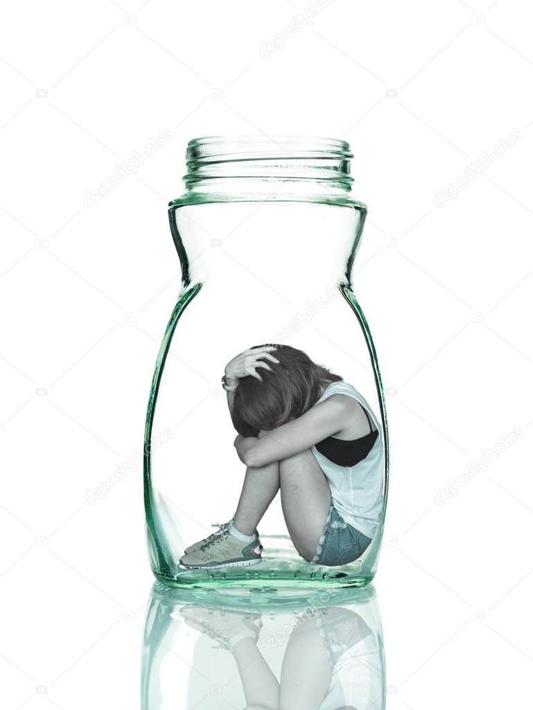 Sad woman sitting alone in a jar — Stock Photo © Tzido #98479260