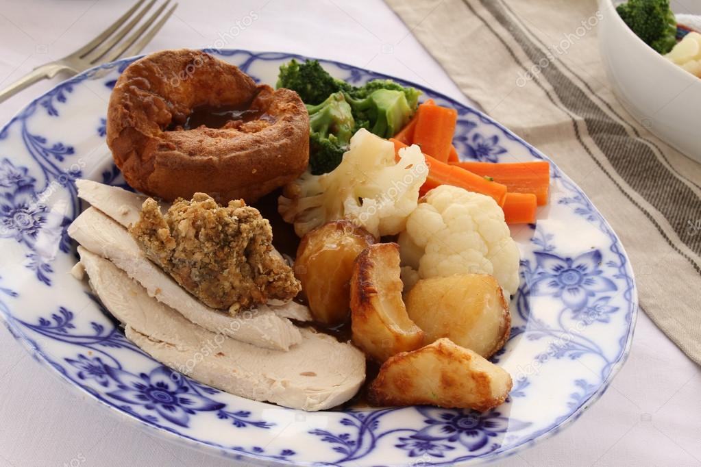 Traditional roast chicken dinner Stock Photo by ©neillangan 121555078
