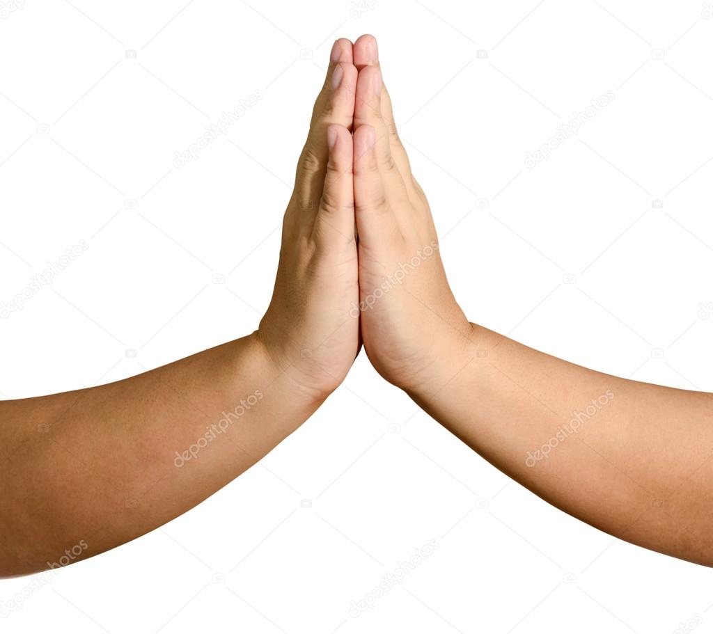 Adult Man With His Hands Placed Together In Prayer In Front Of A
